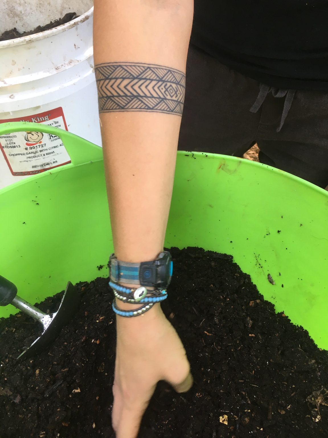 compost_in_bucket_with_womans_arm – KCPW